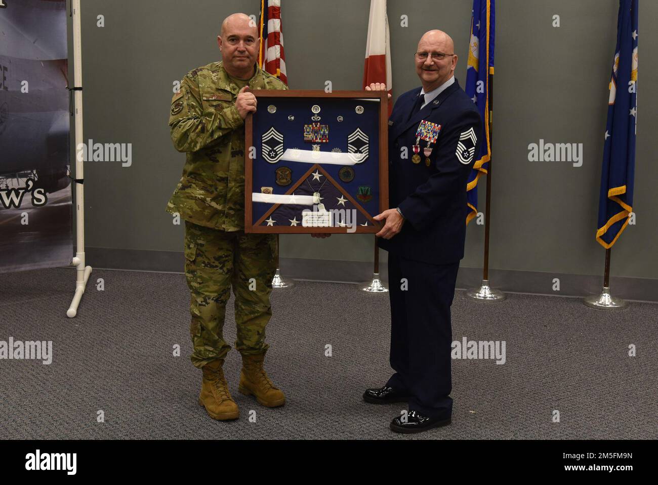 Members of the 117th Air Refueling Wing attend Chief Master Sgt. John ...