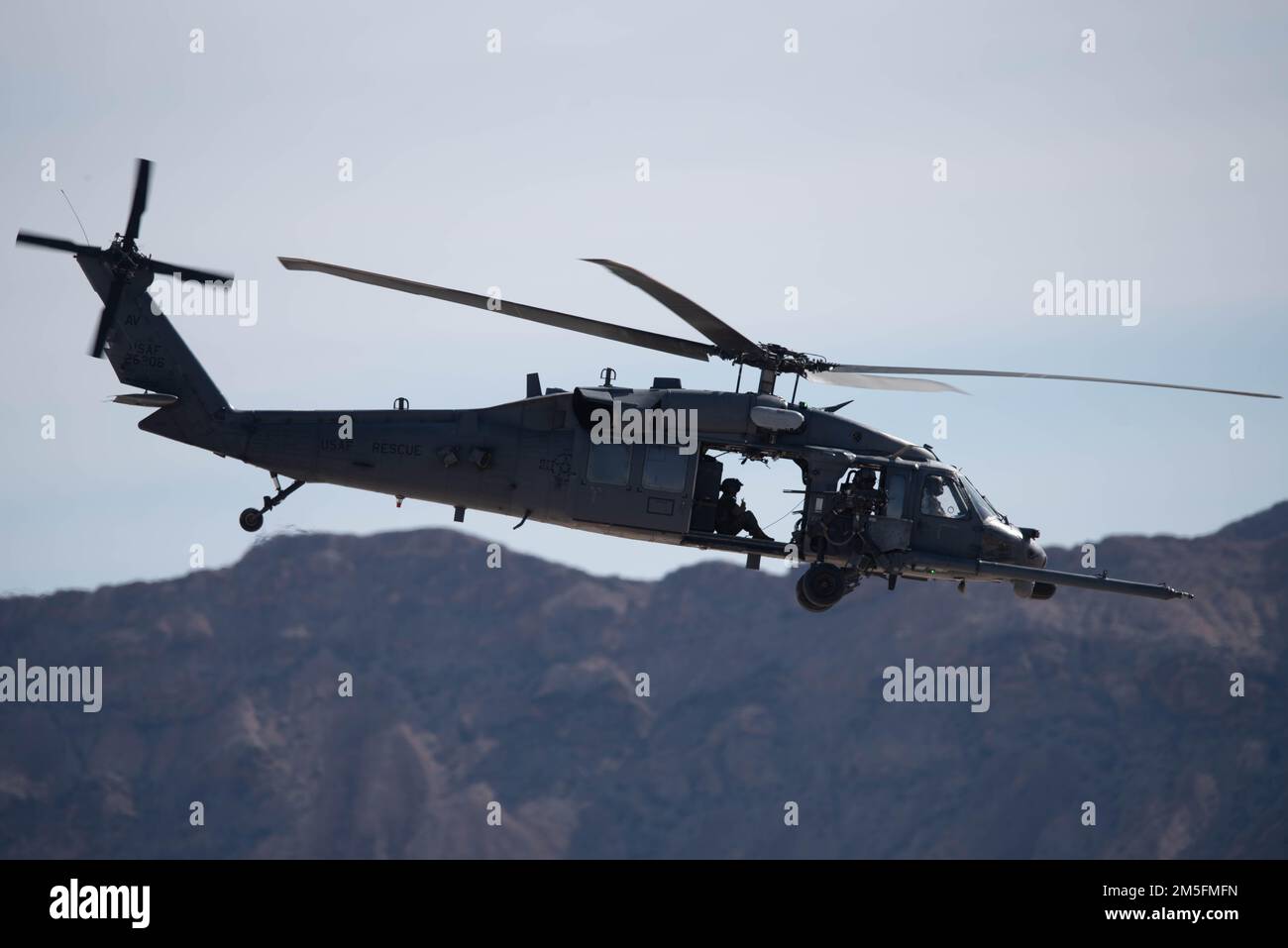 The crew of a U.S. Air Force HH-60G Pave Hawk performs mock combat ...