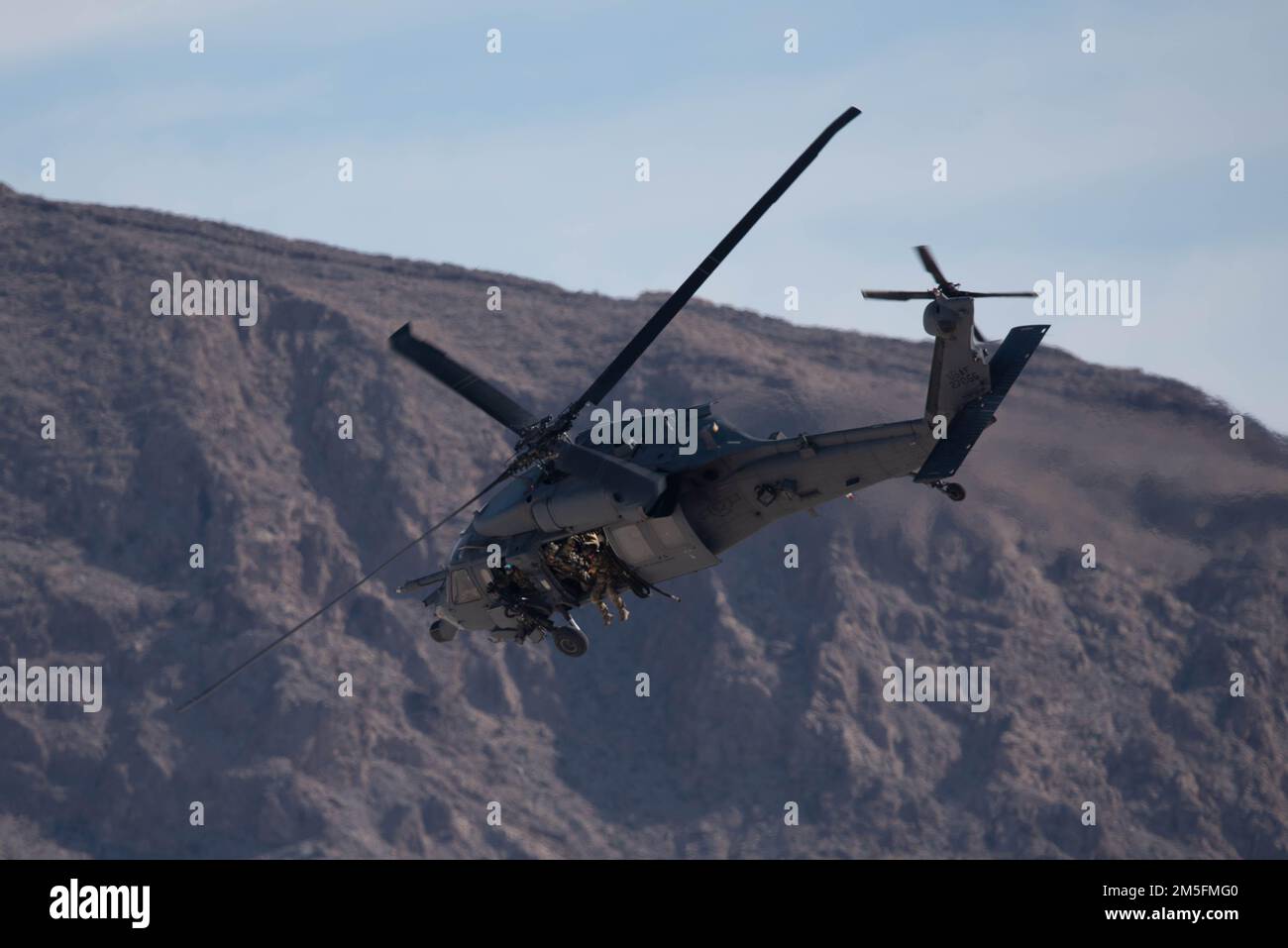 The crew of a U.S. Air Force HH-60G Pave Hawk performs mock combat ...