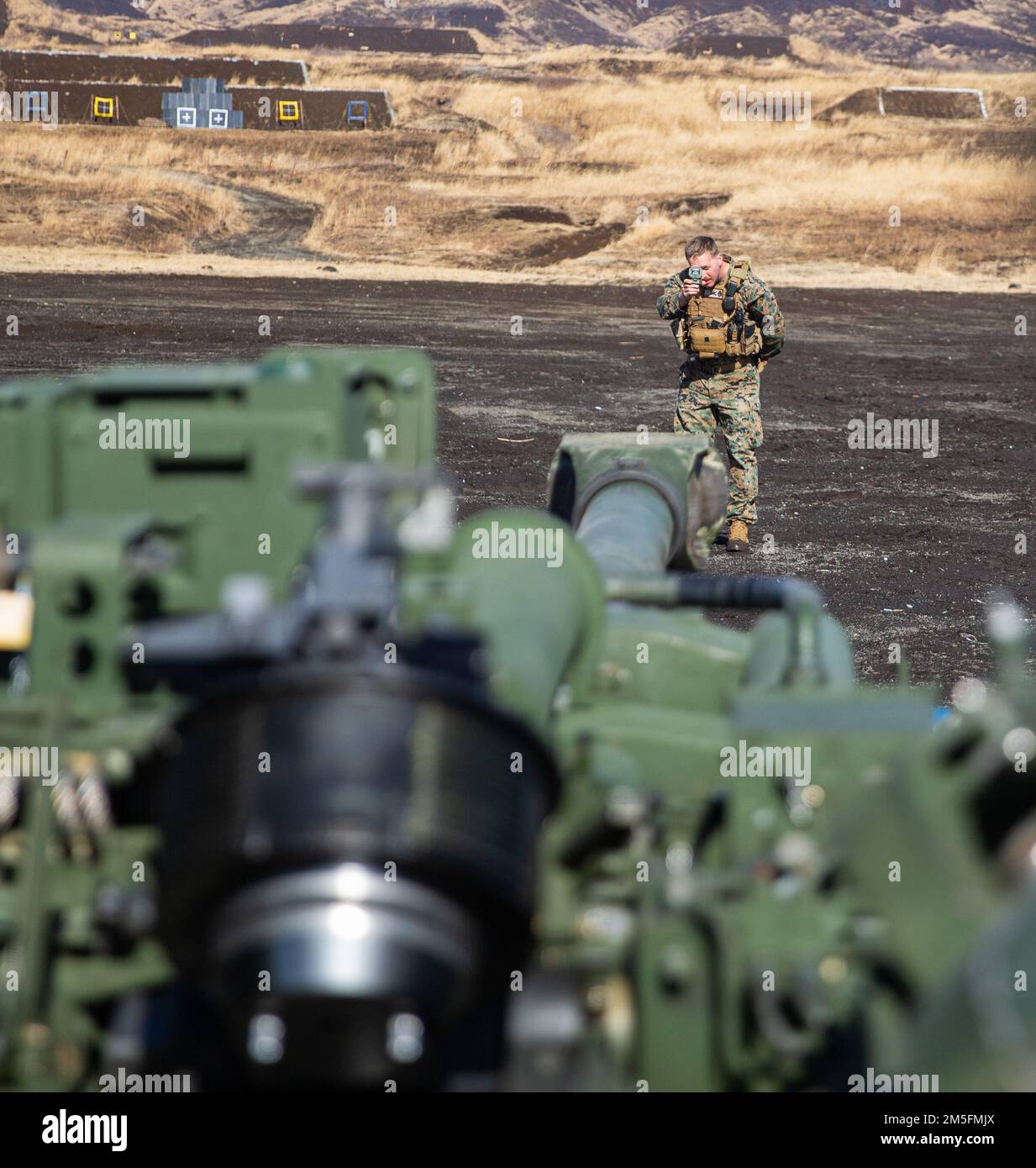 A U.S. Marine with Kilo Battery, Battalion Landing Team 1/5 (BLT 1/5 ...