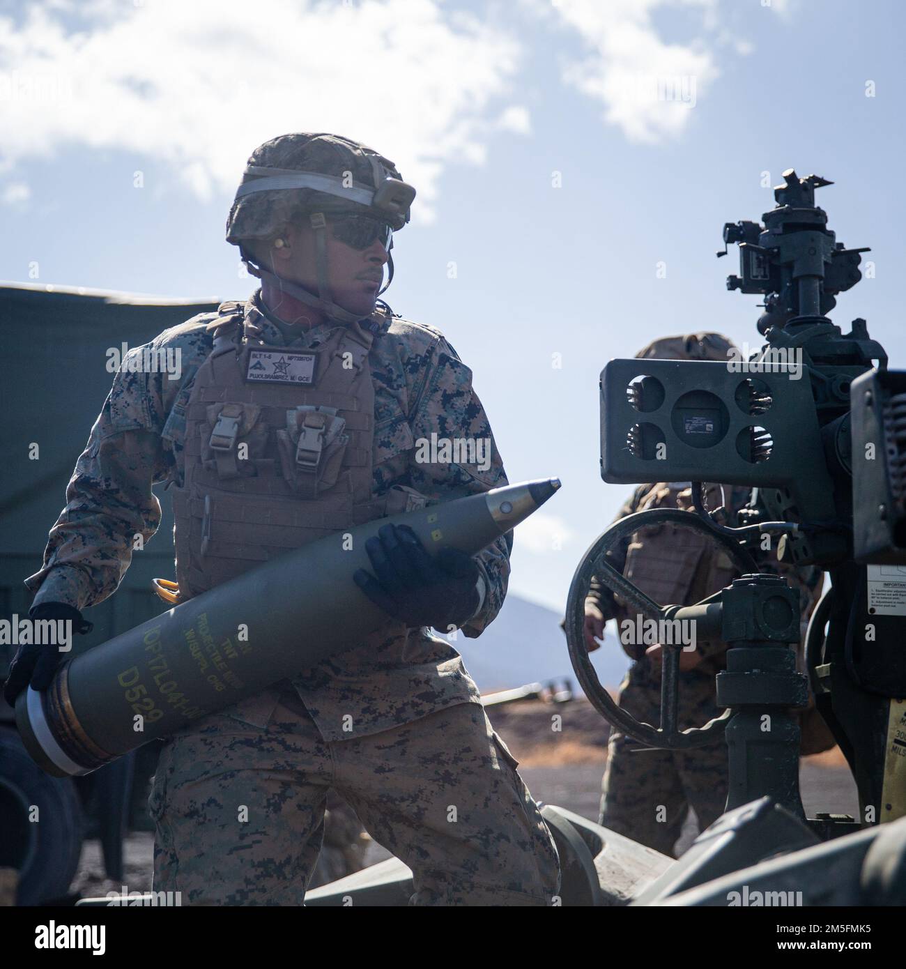 A U.S. Marine with Kilo Battery, Battalion Landing Team 1/5 (BLT 1/5 ...