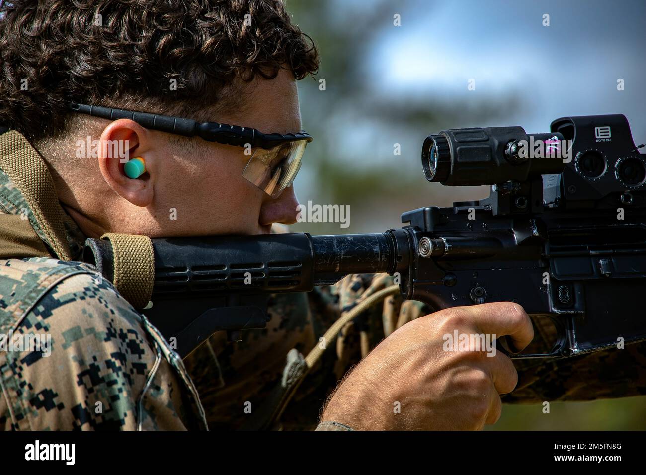 U.S. Marine Corps Cpl. Benjamin Smith, a reconnaissance scout with ...