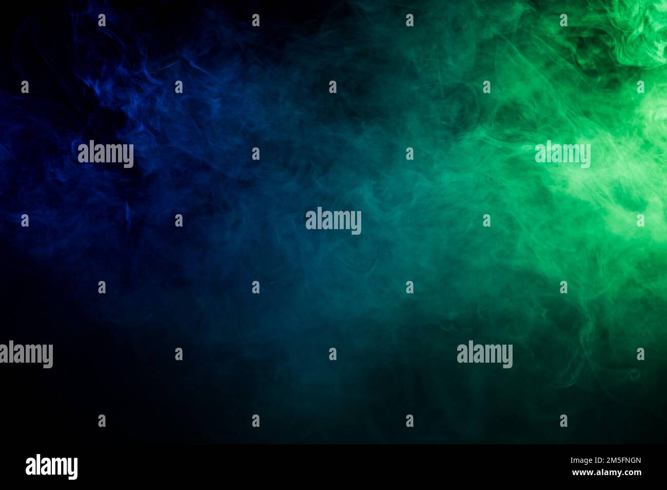 Green-blue smoke in neon light on black background Stock Photo - Alamy