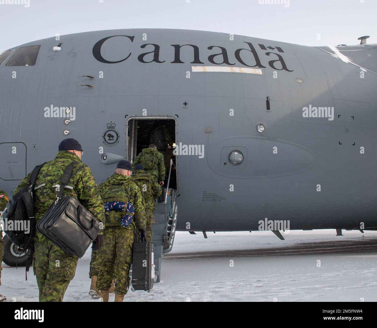 Royal Canadian Air Force members from 3 Wing, Bagotville, Quebec, board ...