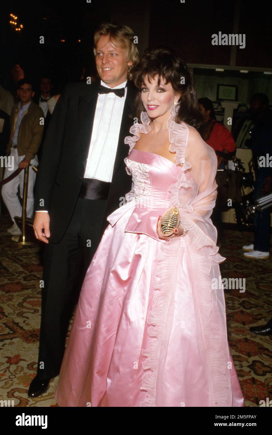 Joan Collins and Peter Holm at the Gala Dinner Tribute to Aaron ...