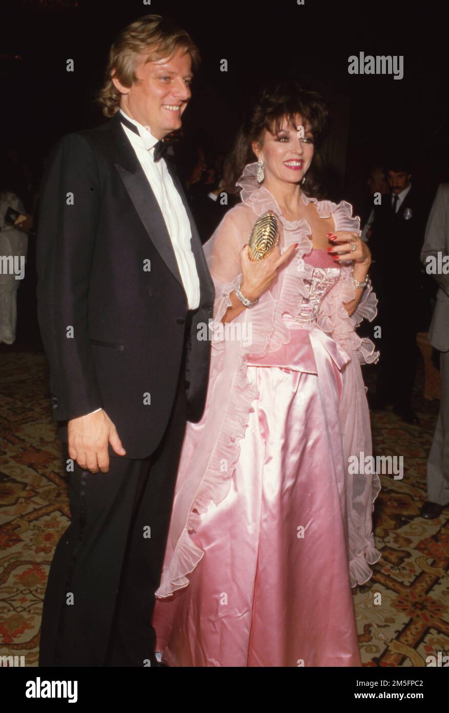 Joan Collins and Peter Holm at the Gala Dinner Tribute to Aaron ...