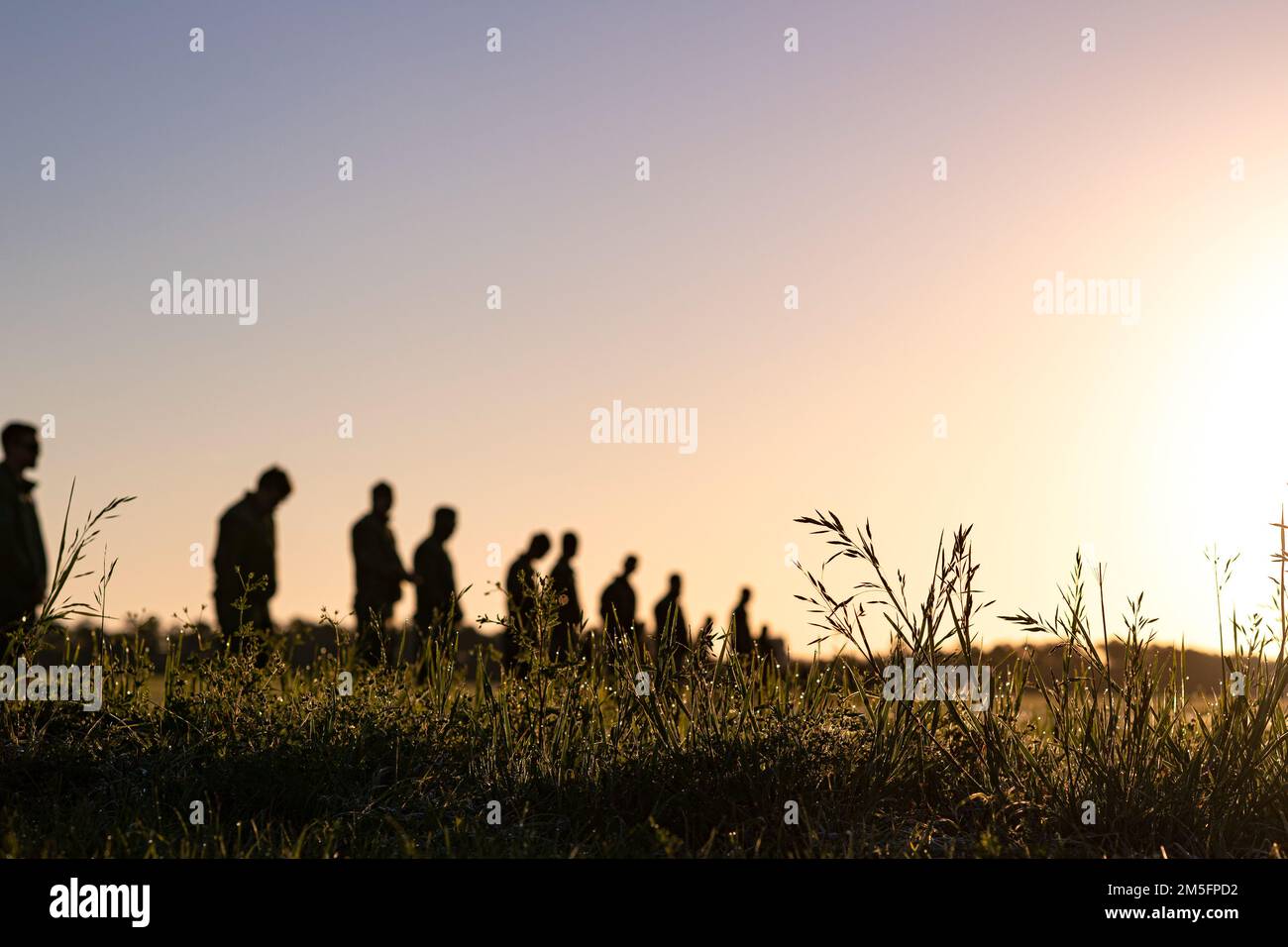 U.S. Air Force Airmen with the 23rd Wing line up on the flightline to ...