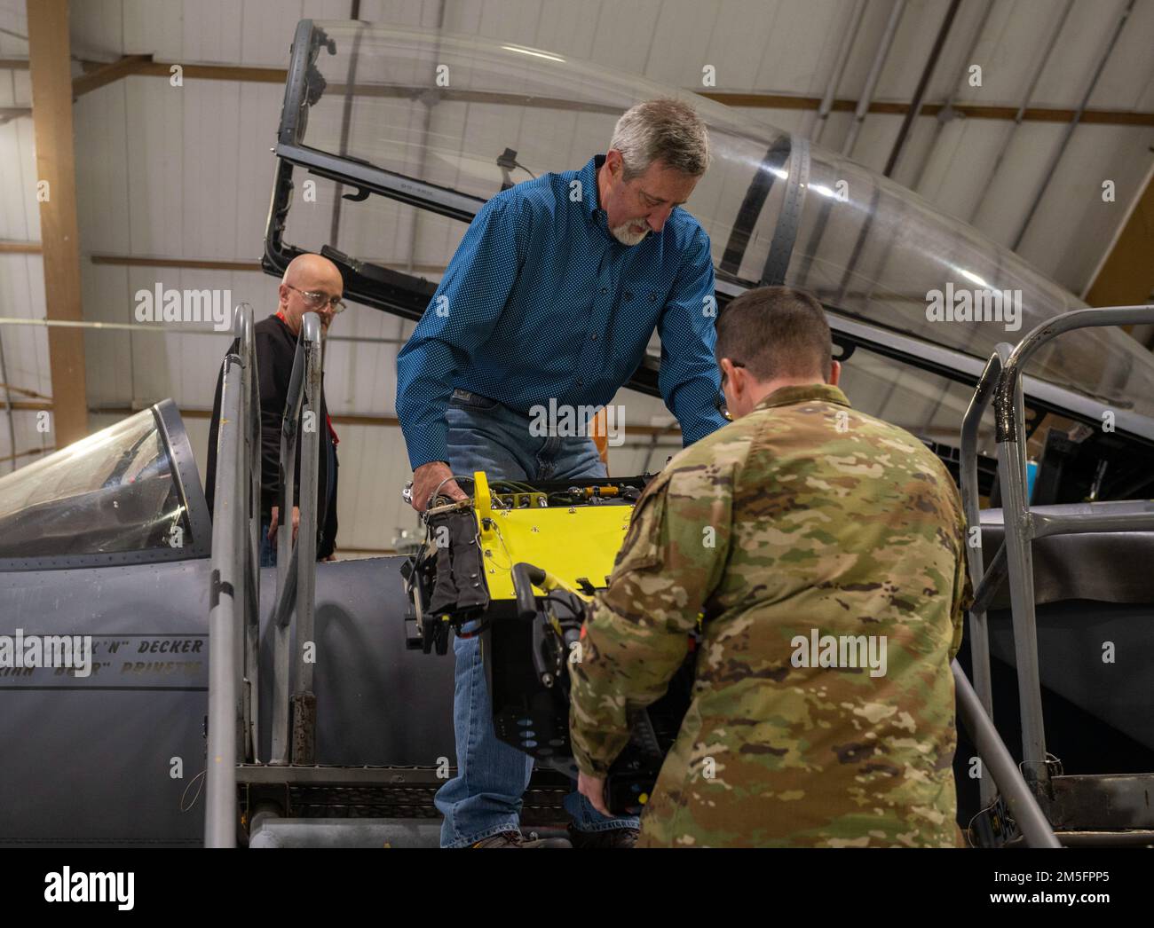 An Airman from the 4th Fighter Wing and an engineer contracted by the U ...