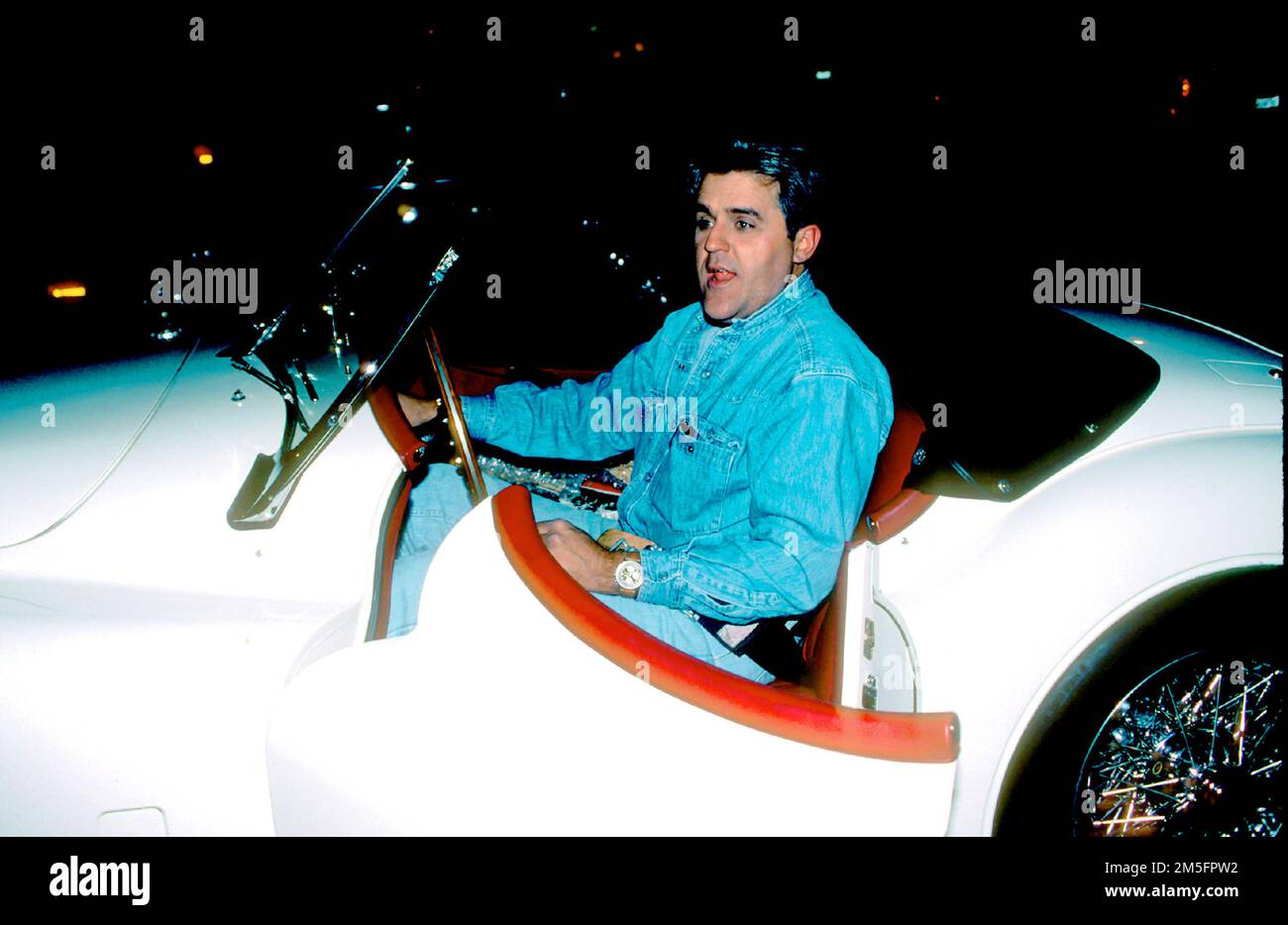 Jay Leno in one of his many cars at the NBC studios lot 1991 Credit ...