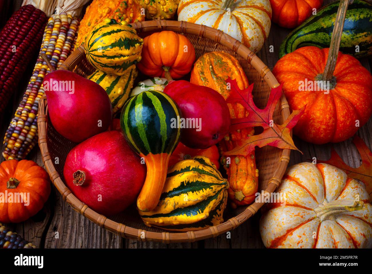 Baskey Full Of Fruit And Gourds Stock Photo - Alamy