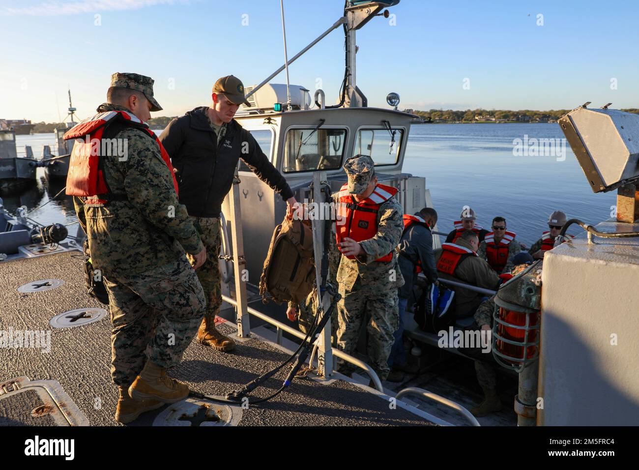 U.S. Marines with 3rd Marine Logistics Group and U.S. Navy Sailors with ...