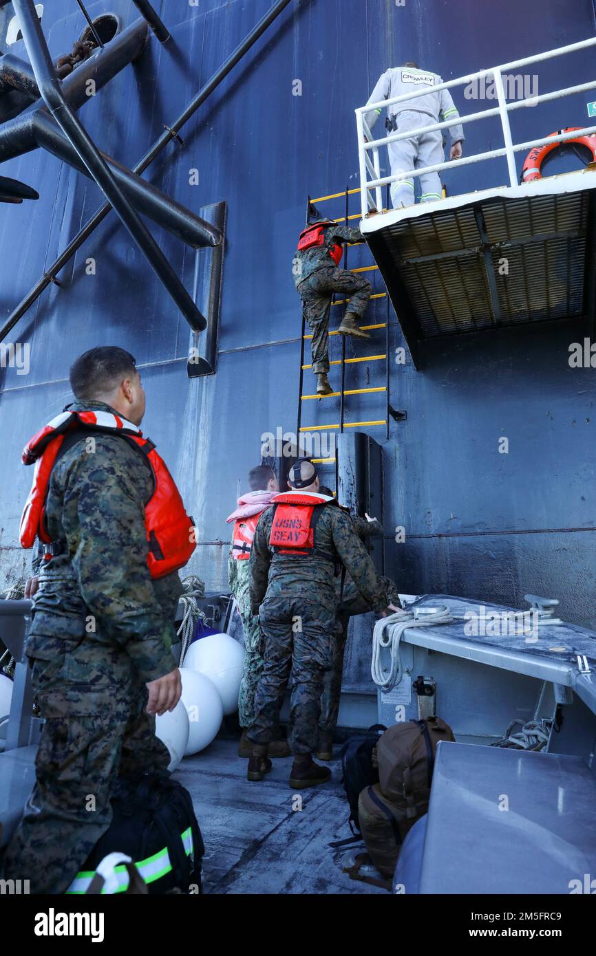 U.S. Marines with 3rd Marine Logistics Group and U.S. Navy Sailors with ...