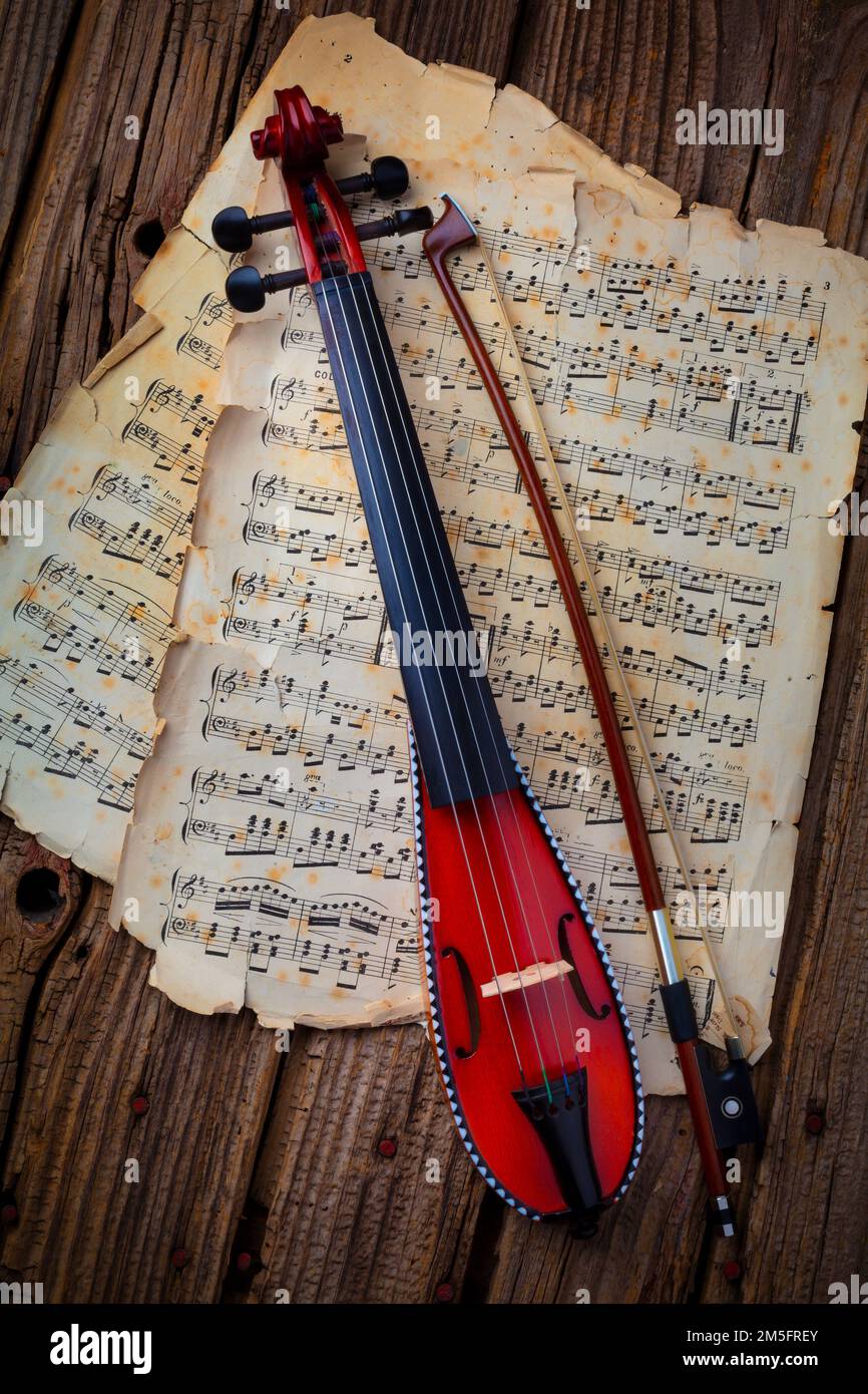 Pocket Violin On Sheet Music Still Life Stock Photo - Alamy