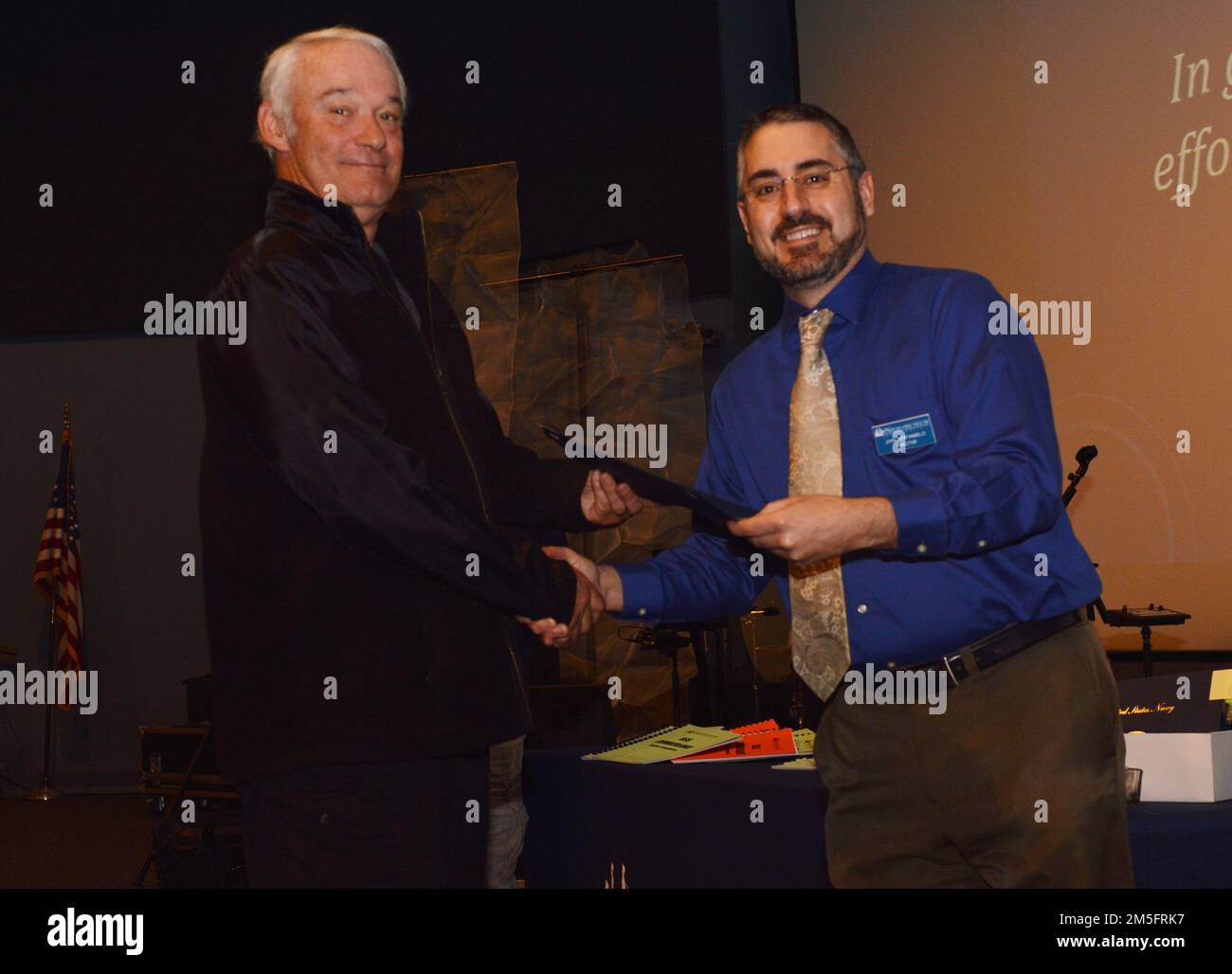 Museum Volunteer Bill Filbert (left) receives a volunteer appreciation ...