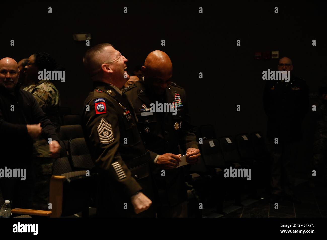 Command Sgt. Maj. Michael J. Perry III (left), senior enlisted advisor ...