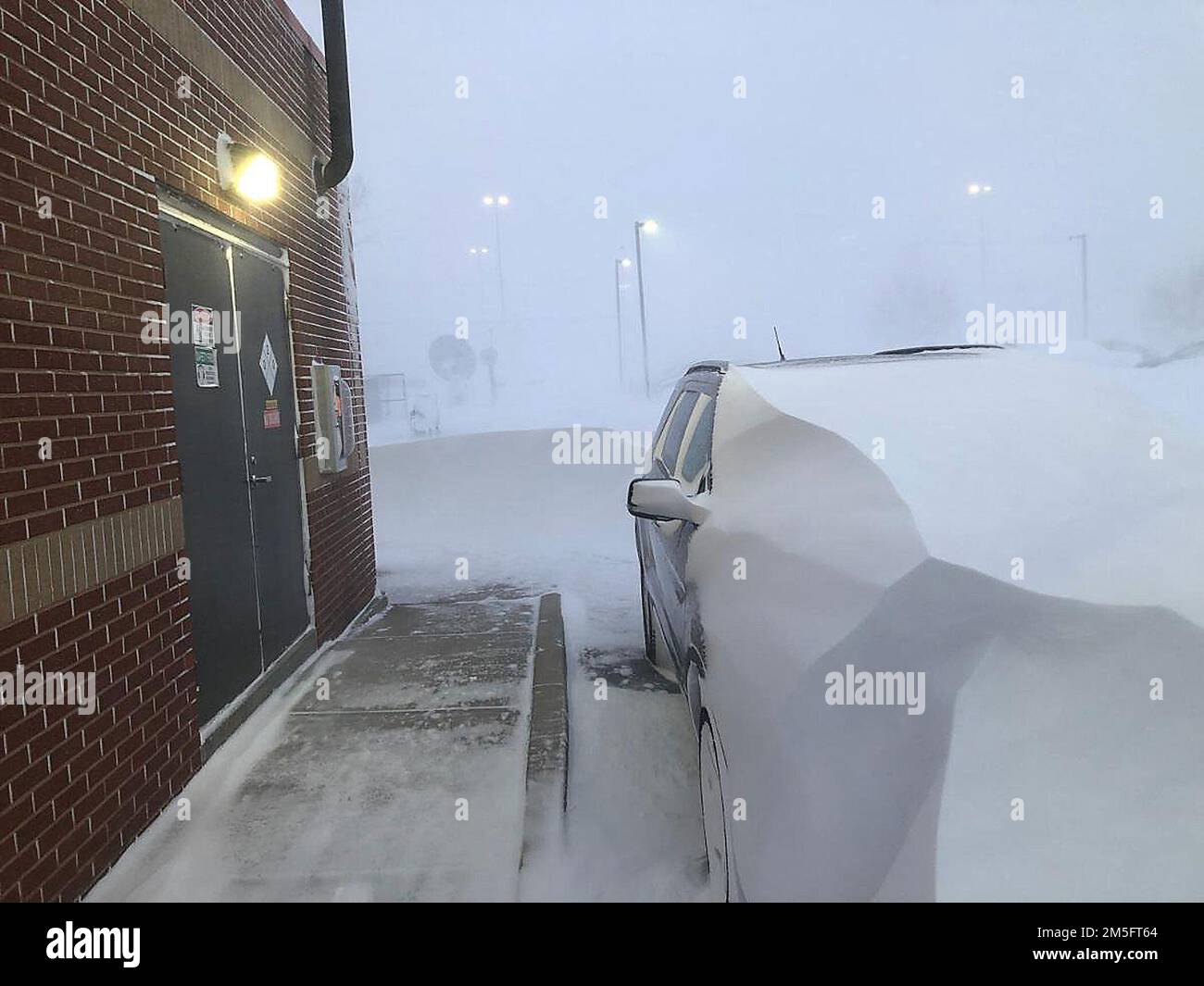 December 24, 2022, Lancaster, New York, USA: Vehicles are covered in ...