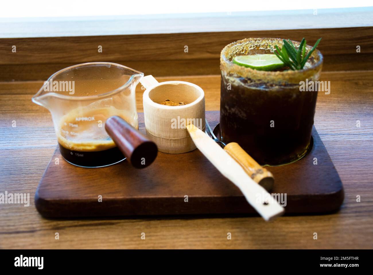 Espresso black coffee serve with brown sugar cane and ice cold lemon ...