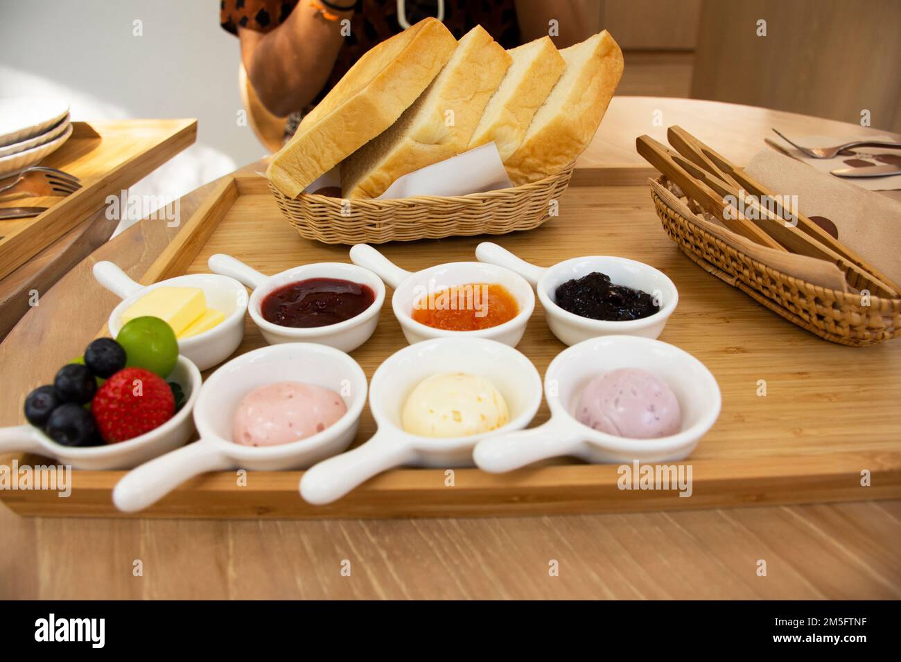 Bread toast and variety fruits jam for thai people travelers travel ...