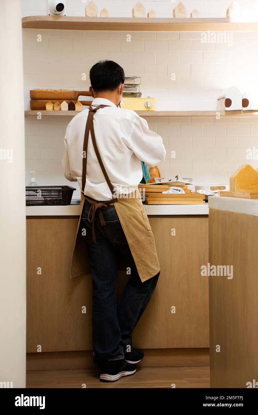 Barista men staff and service worker man working in classic modern cafe ...
