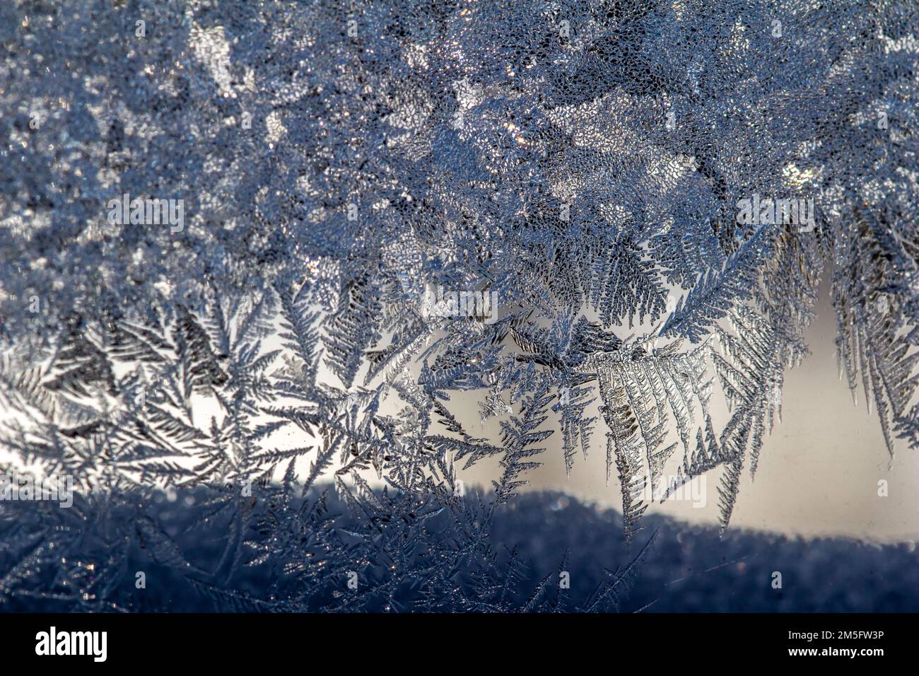 Abstract macro texture background of a natural ice frosted glass window ...