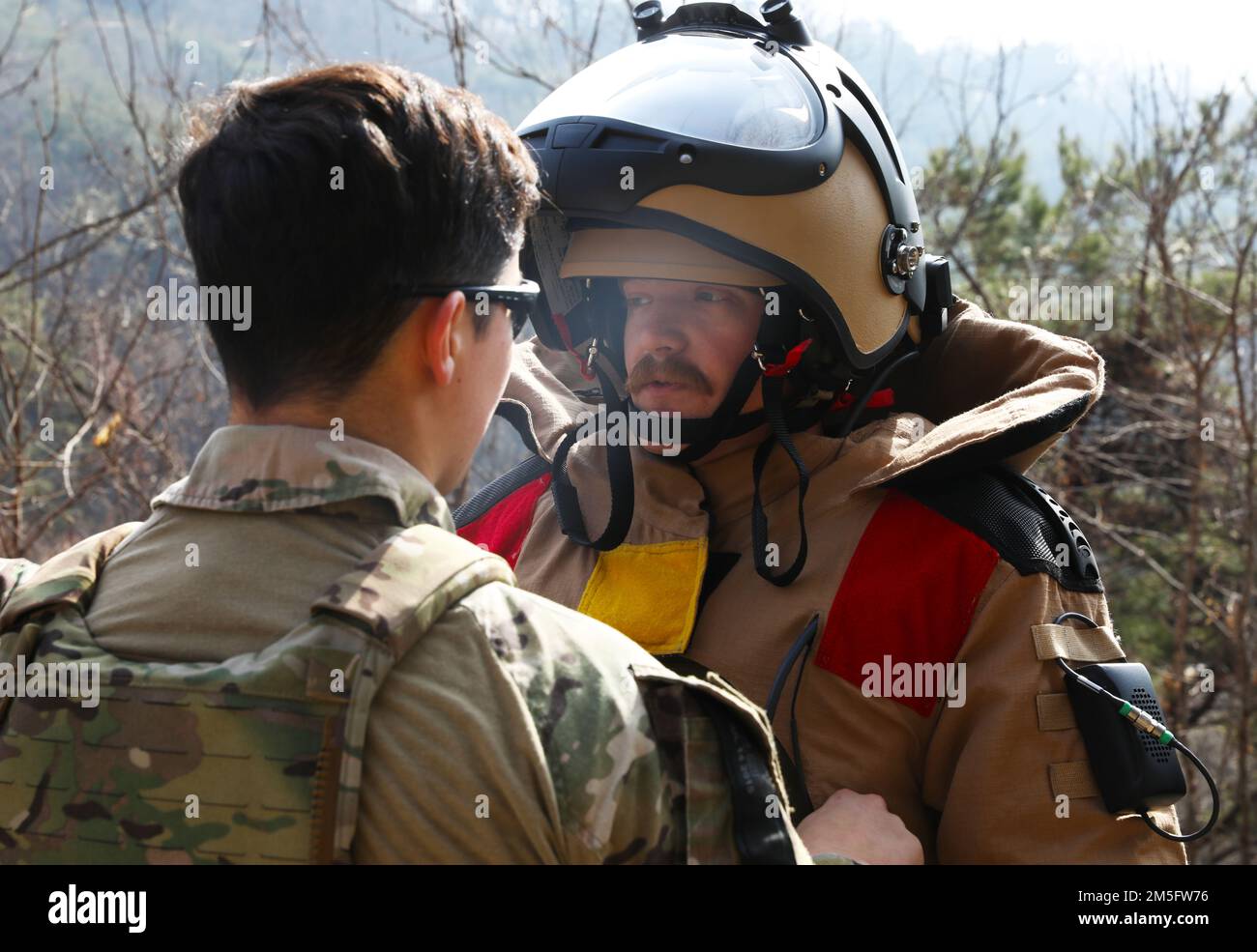 U.S. Army Soldier assigned to the 718th Ordnance Company dons ...