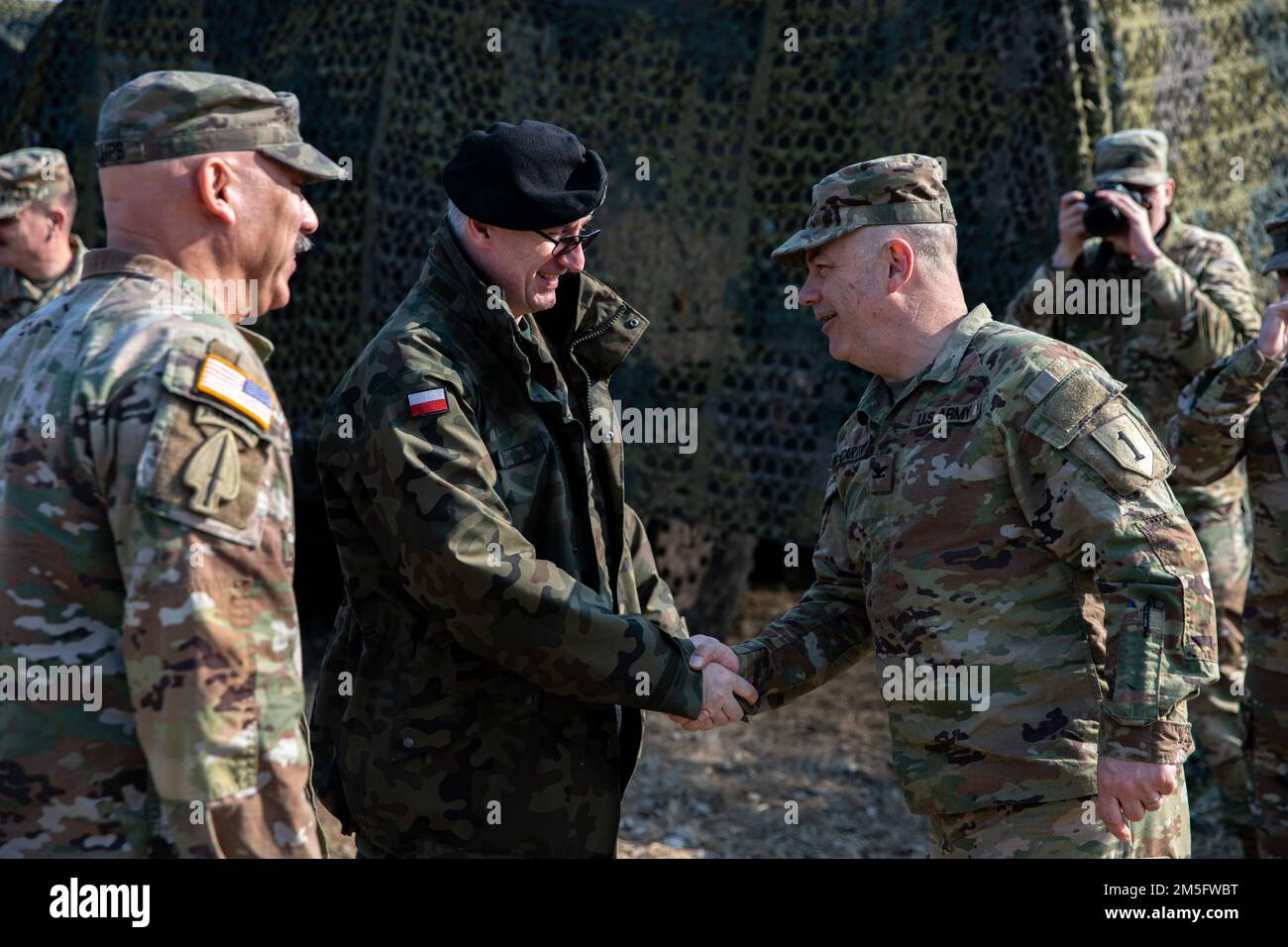 Col. Brian McCarthy (center, right), commander of 1st Armored Brigade ...
