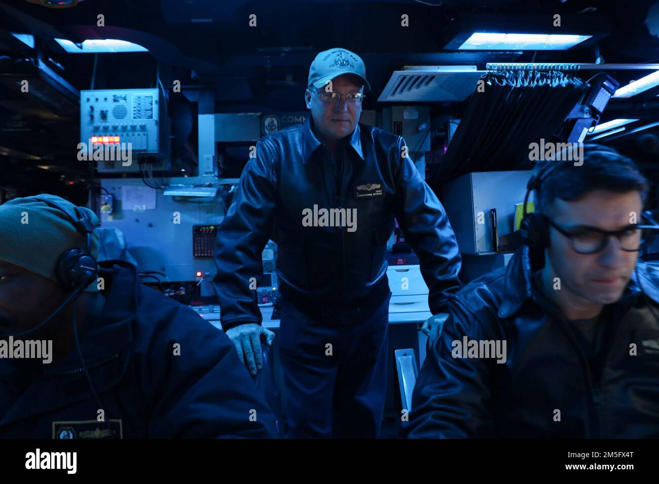 EAST CHINA SEA (March 15, 2022) Capt. Jeremy Gray, commanding officer ...