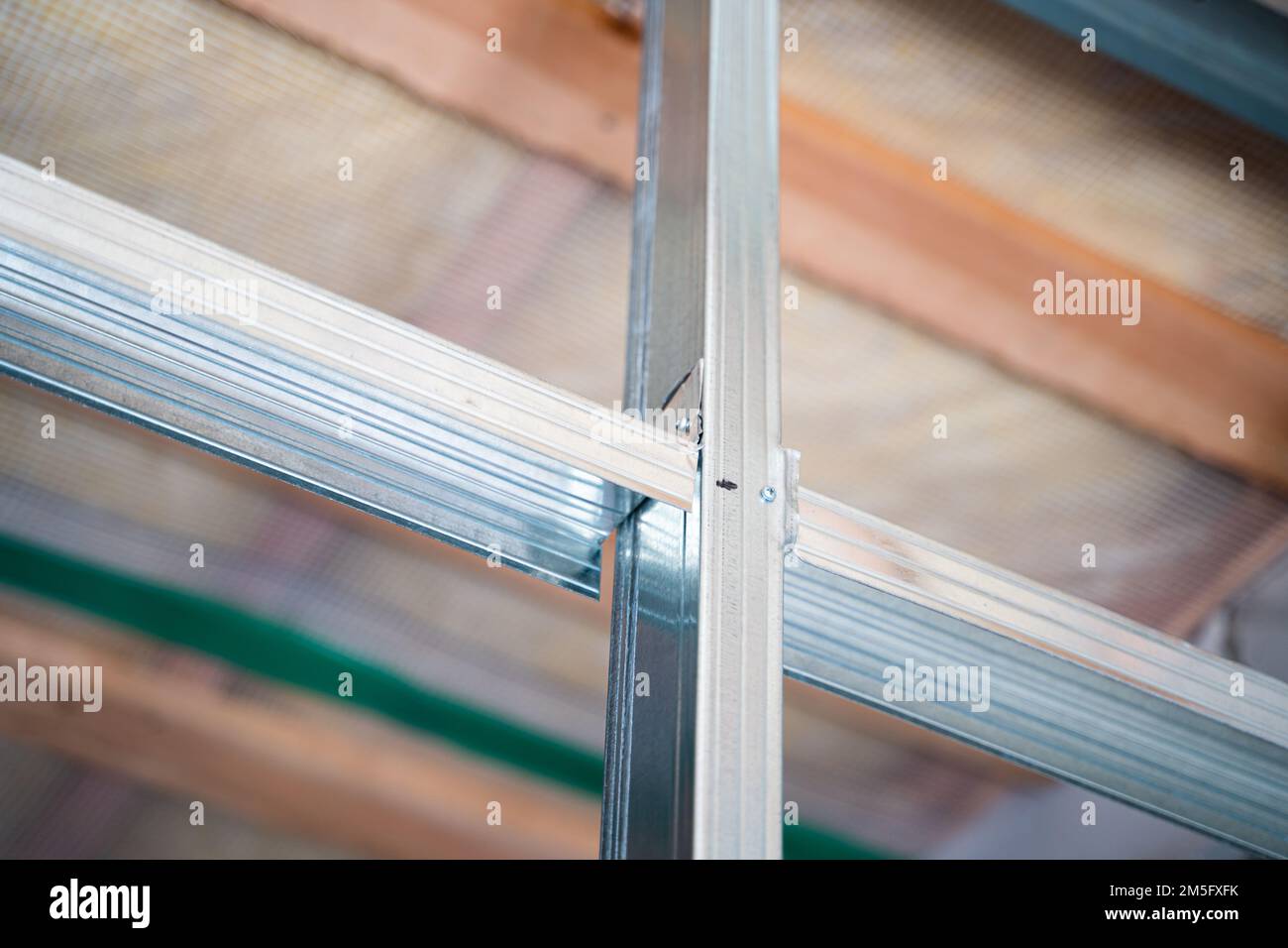 Stiffening ribs in a metal profile frame in a plasterboard wall close ...