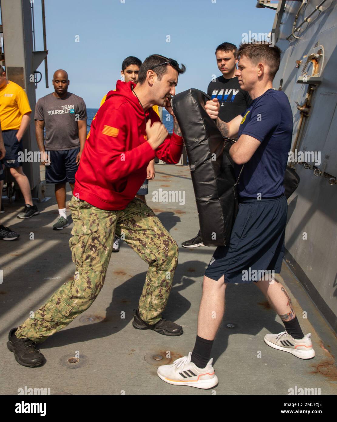SOUTH CHINA SEA (March 15, 2022) Master-at-Arms 1st Class Joe Ramirez ...