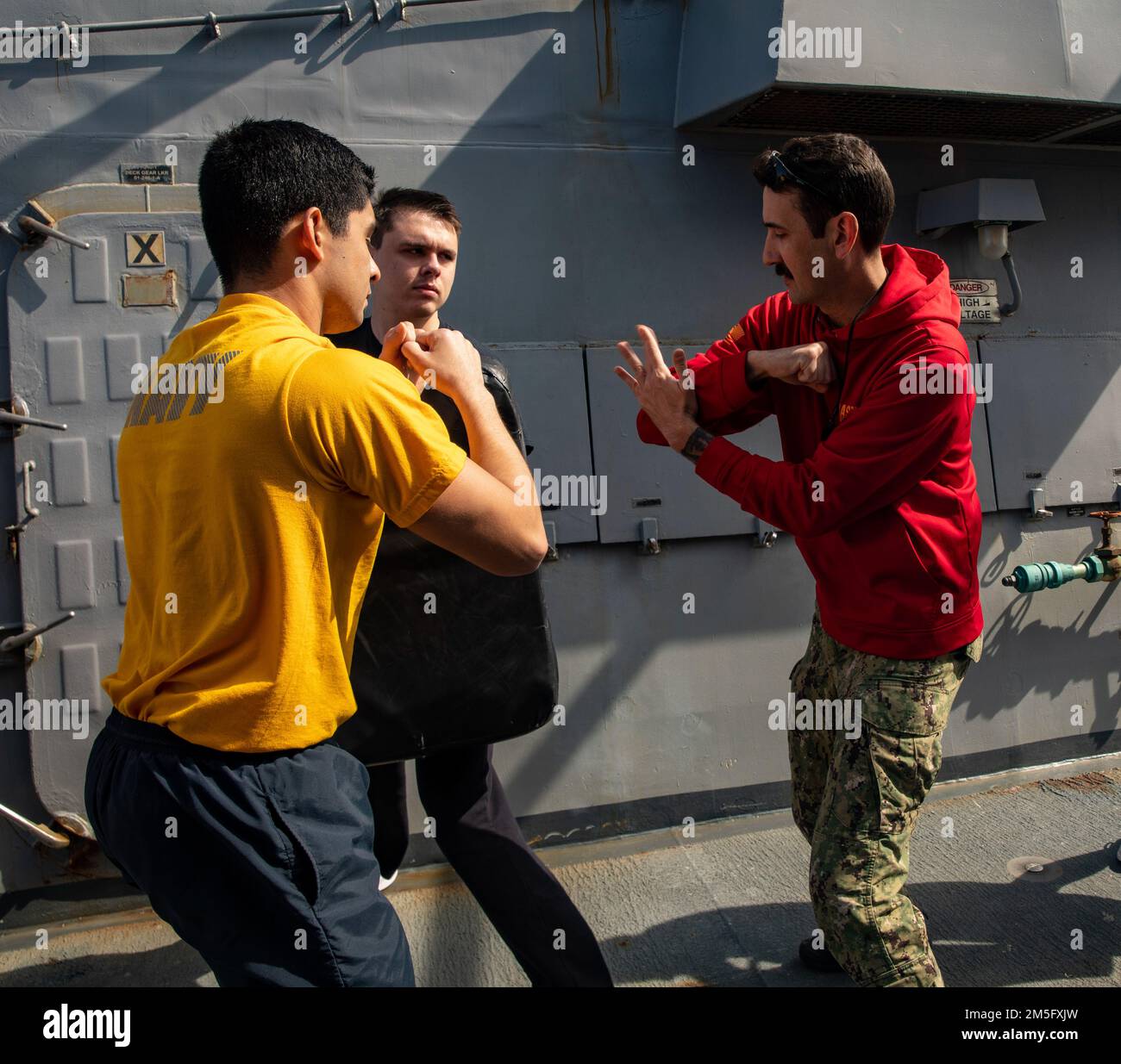 SOUTH CHINA SEA (March 15, 2022) Master-at-Arms 1st Class Joe Ramirez ...