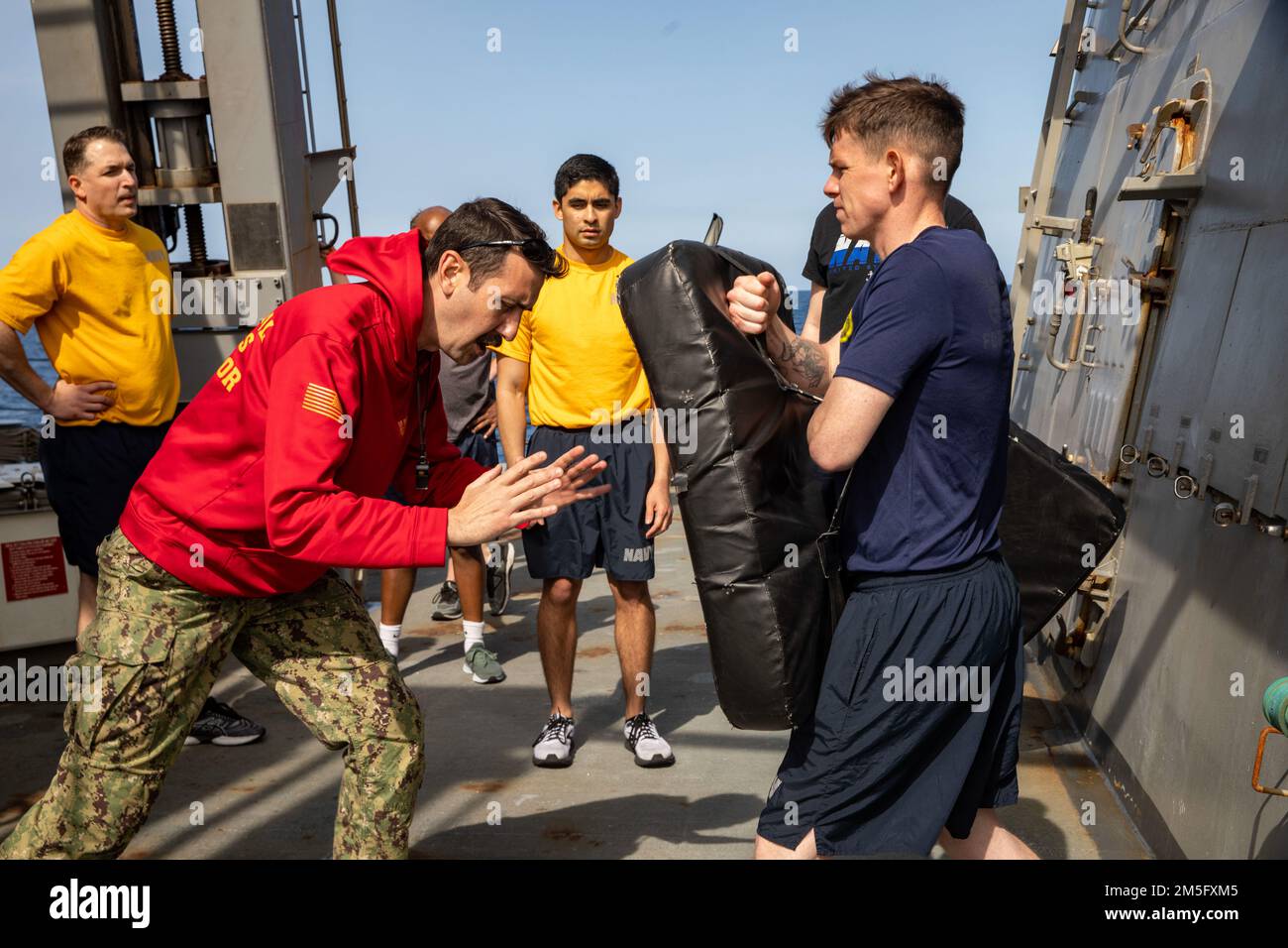 SOUTH CHINA SEA (March 15, 2022) Master-at-Arms 1st Class Joe Ramirez ...