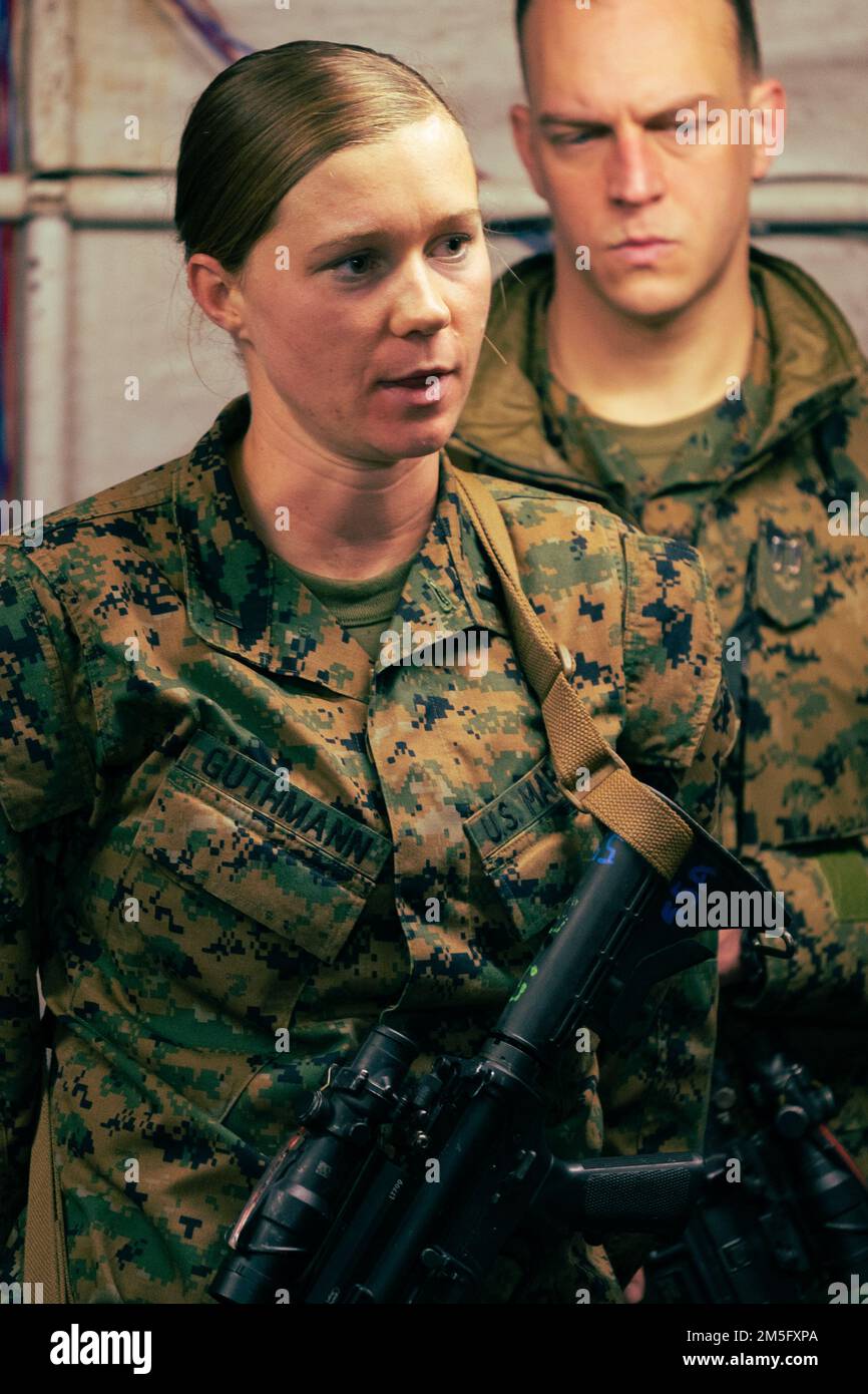 U.S. Marine Corps 1st Lt. Elizabeth Guthmann briefs the capabilities of ...