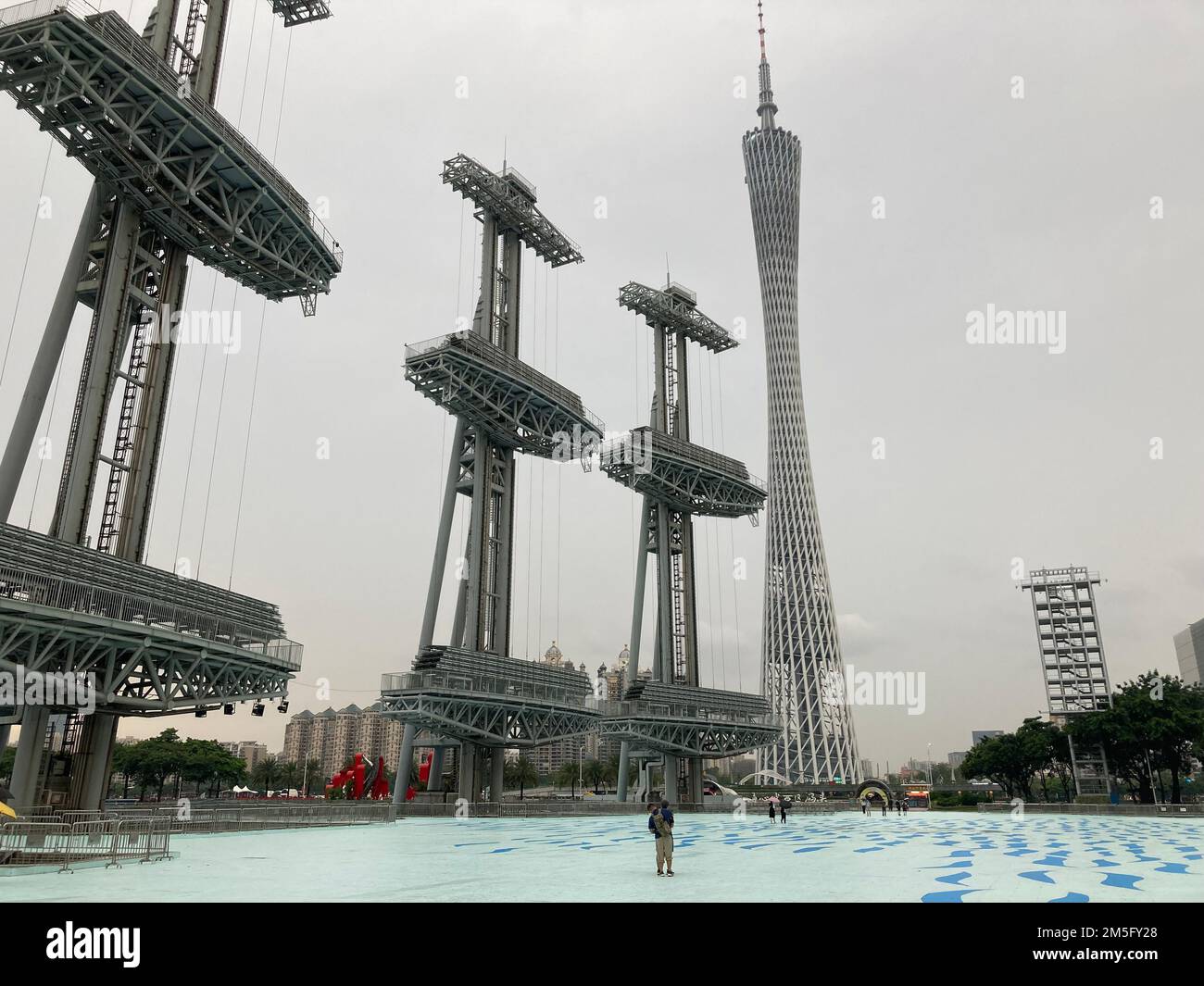 The Canton Tower of South Plaza from Open-air stadium against gray sky ...