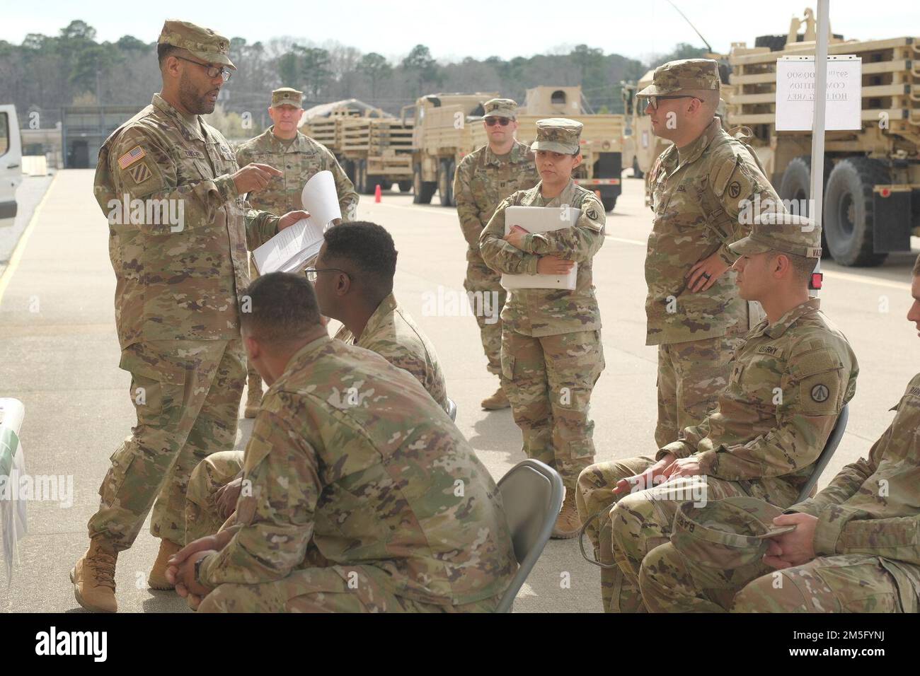 Soldiers are briefed on how to conduct Preventive Maintenance Checks & Services on a light ...