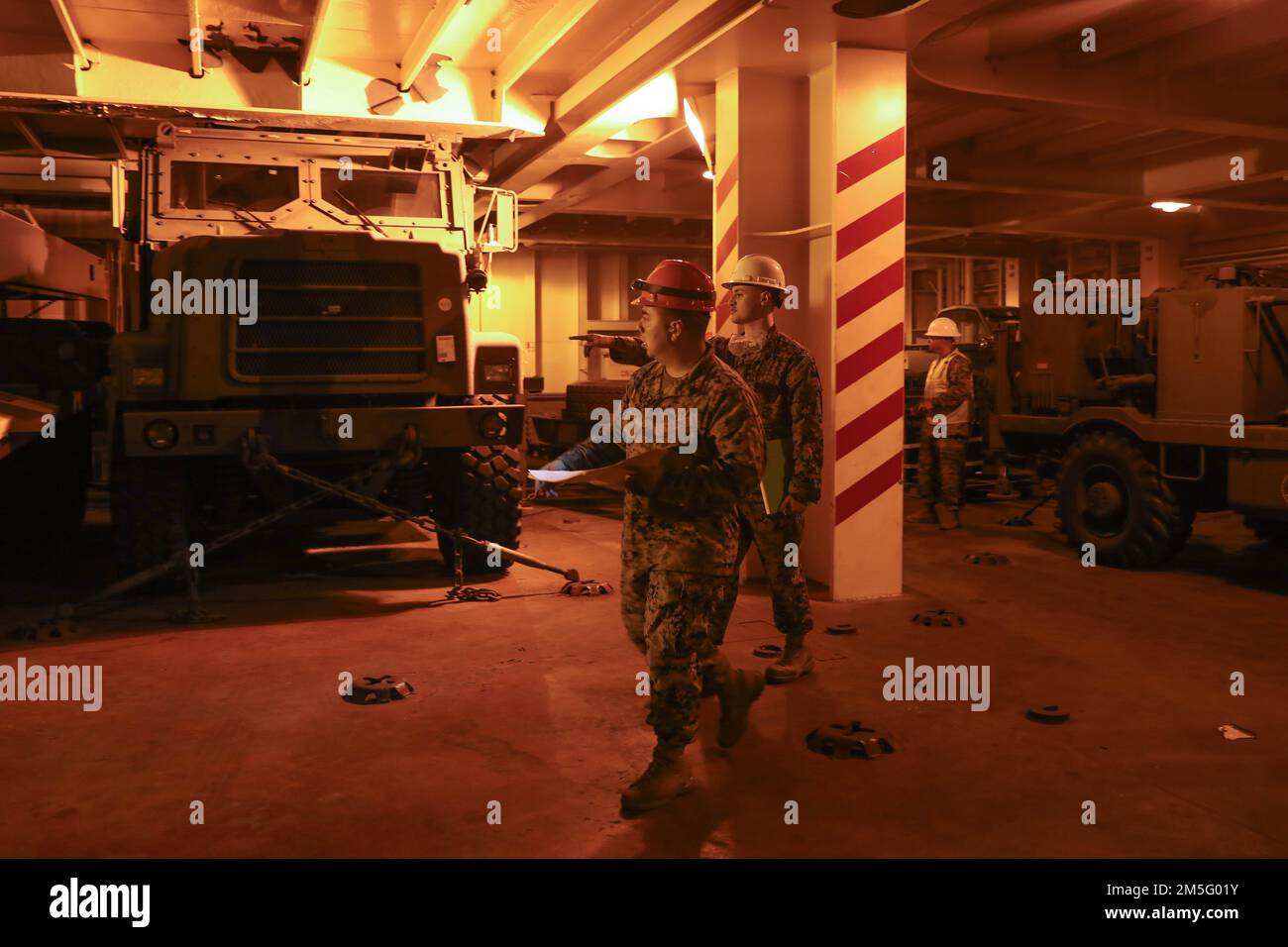 U.S Marine Corps Staff Sgt. Fernando A Garcia, left, an embarkation non ...