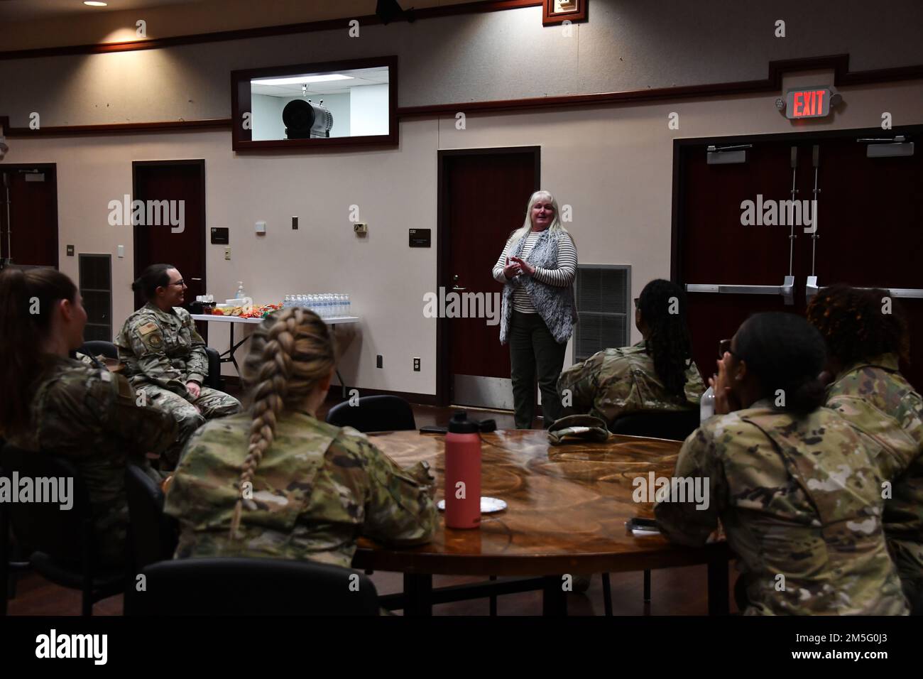 Guest speaker Kim Hubbard, local business owner, speaks to Airmen at ...