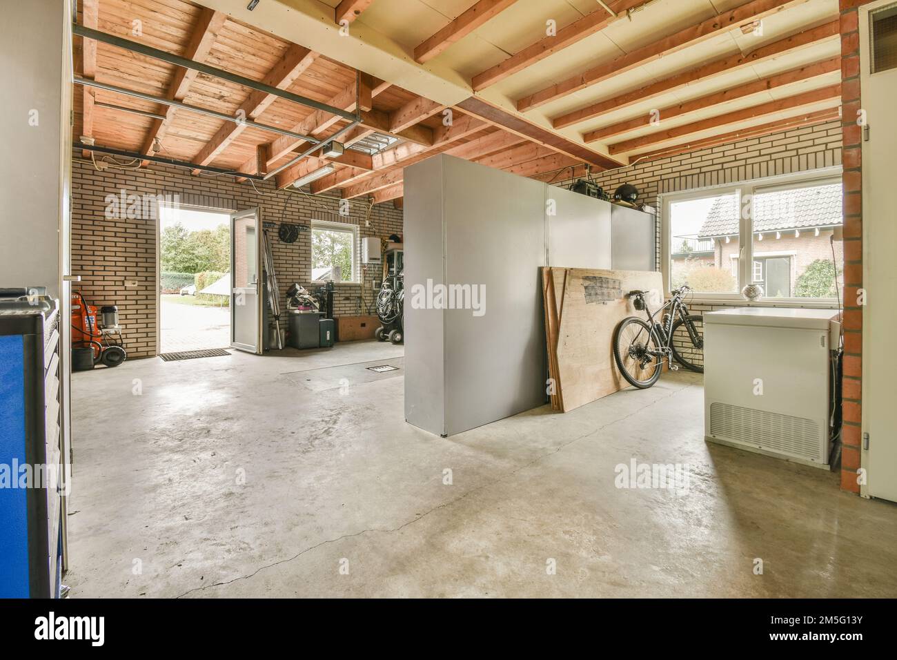 the inside of a building with exposed ceilings and wood beams on the ...