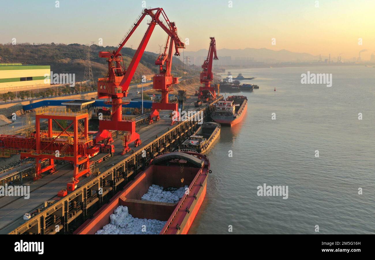 Aerial photo shows the machinery loading and unloading goods and ...