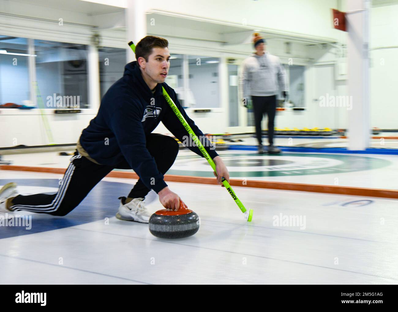 Curling stone slides on ice hi-res stock photography and images - Alamy