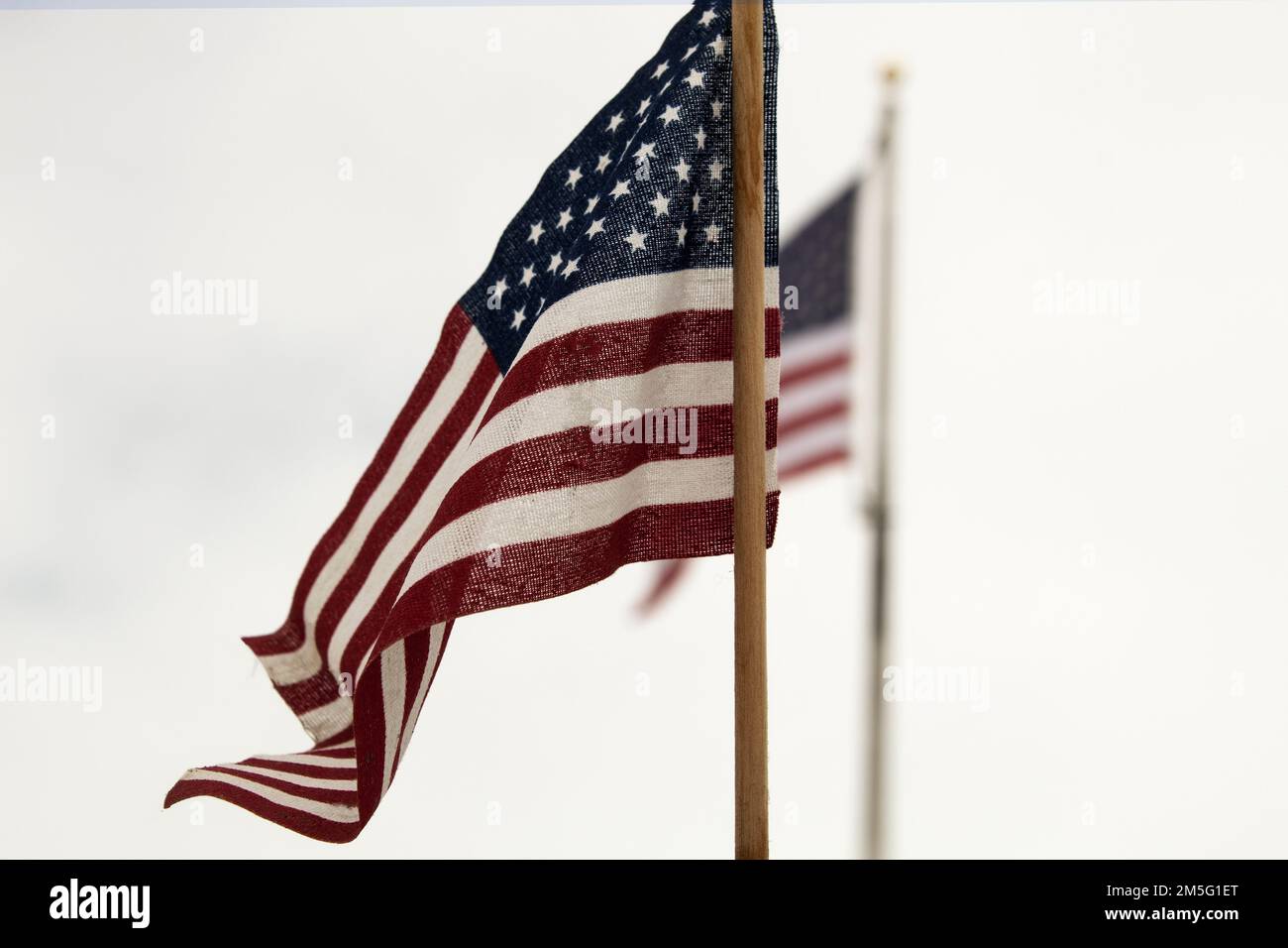 Small American Flag With Large American Flag In Distance Stock Photo ...