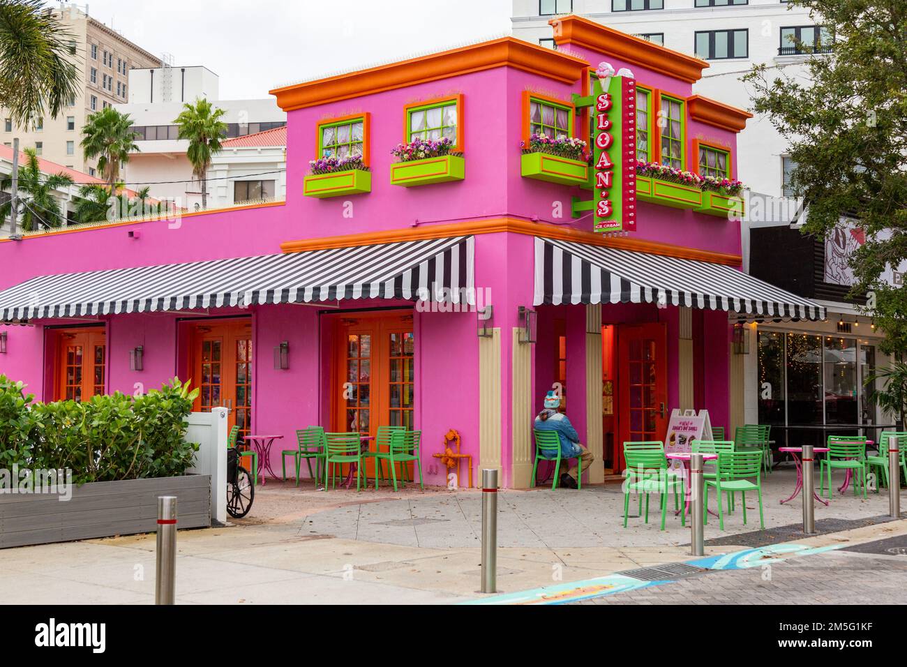The colorful bright pink exterior of the Sloan's Ice Cream Shop ...
