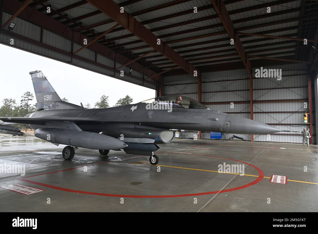 U.S. Air Force pilots and ground crews of F-16C Block 52 fighter jets ...