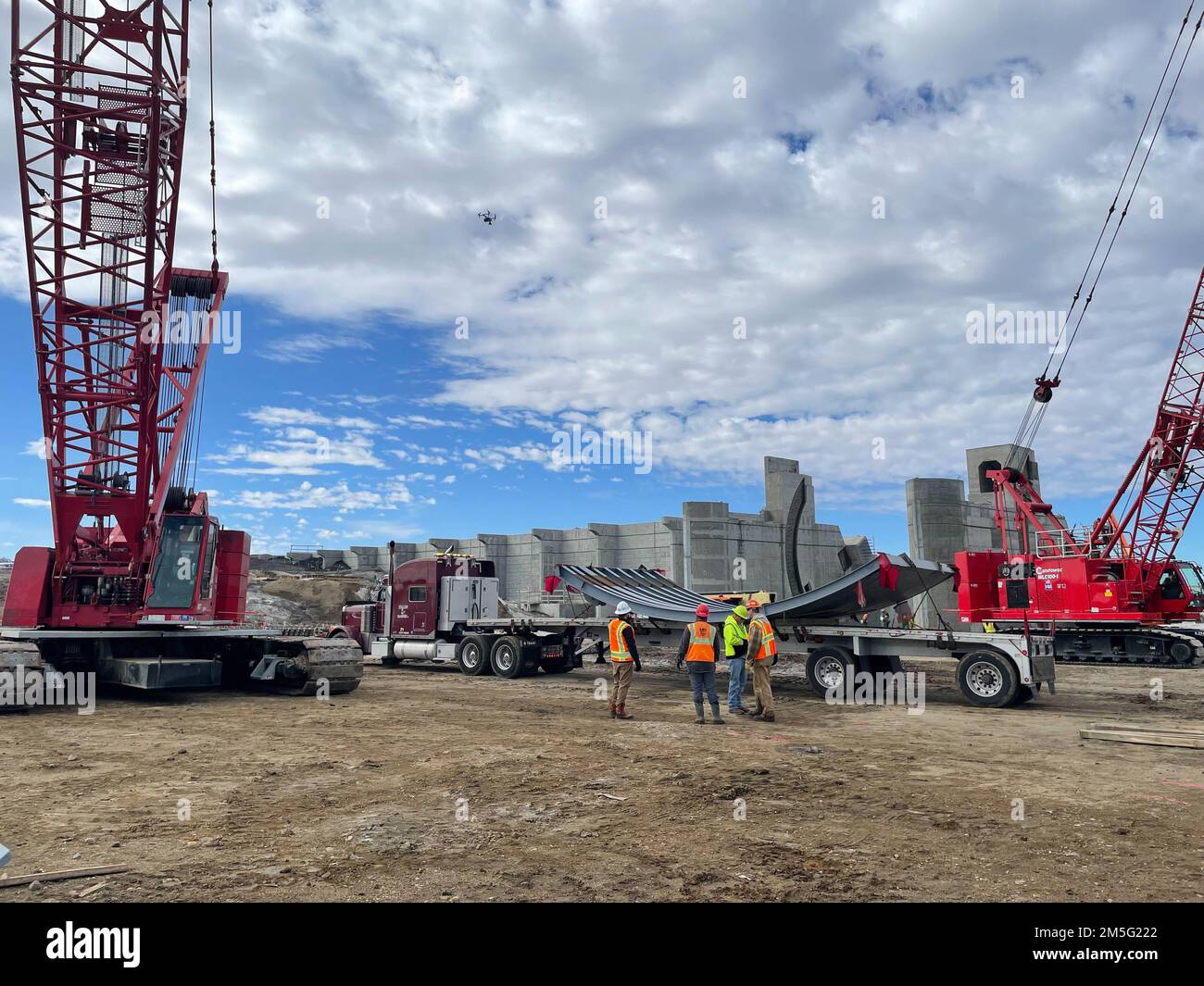 Getting ready to offload the first steel gate Stock Photo - Alamy