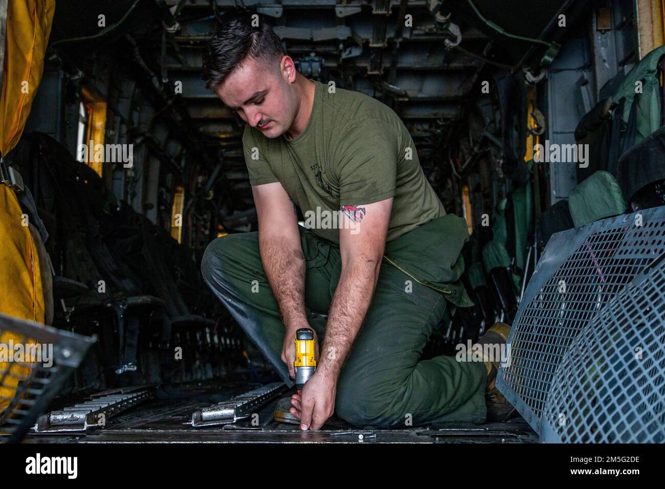 U.S. Marine Corps Lance Cpl. Jason Boucher, a helicopter airframe ...