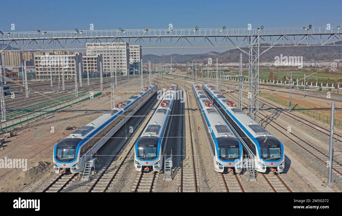 Aerial photo shows several new electric multiple units lying on the rail of Taizhou Suburban ...