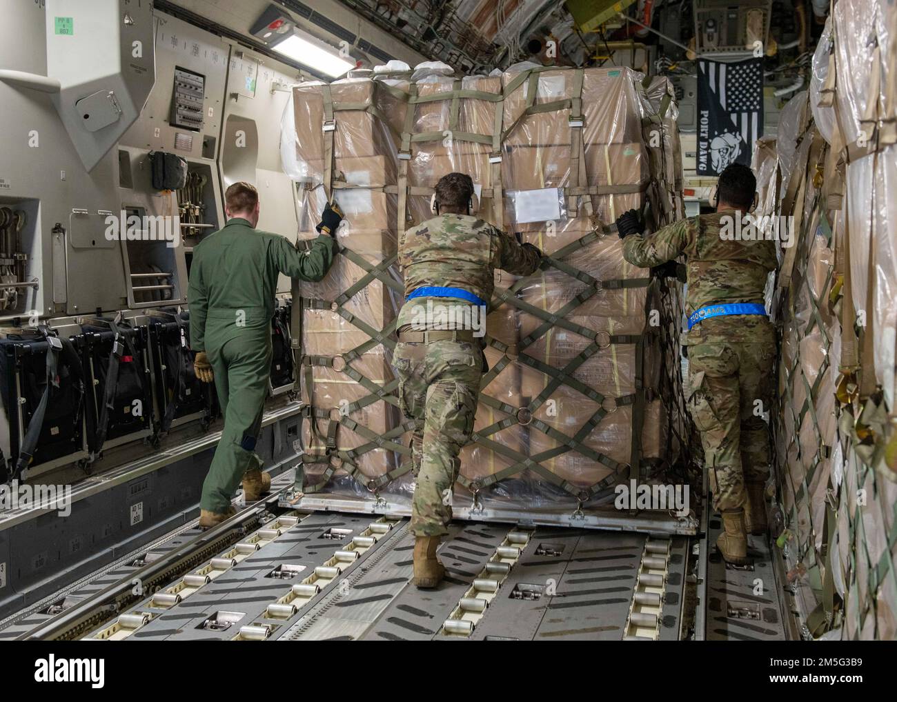 U.S. Airmen form the 730th Air Mobility Squadron and move Government of ...