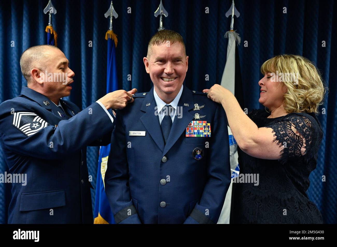 Maj. Gen. Shawn Bratton has his new rank pinned on during his promotion ...