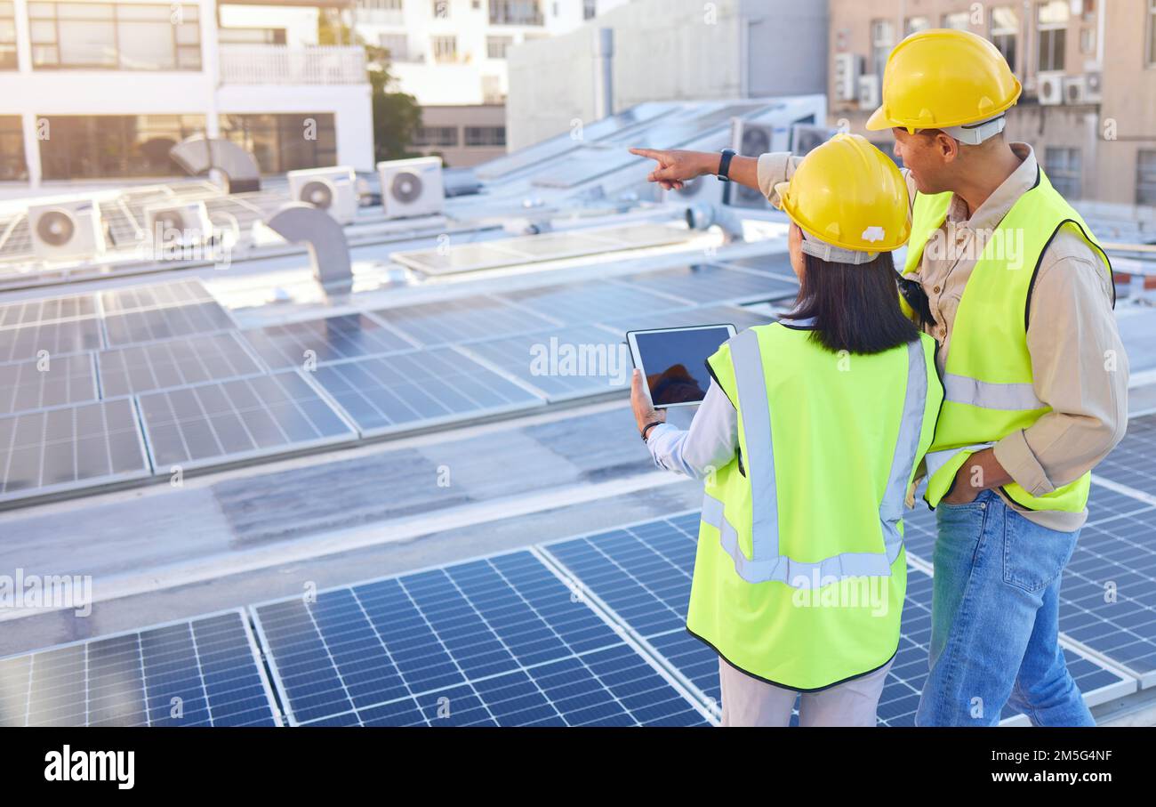 Engineer, back or woman with man, solar energy or sustainable power ...