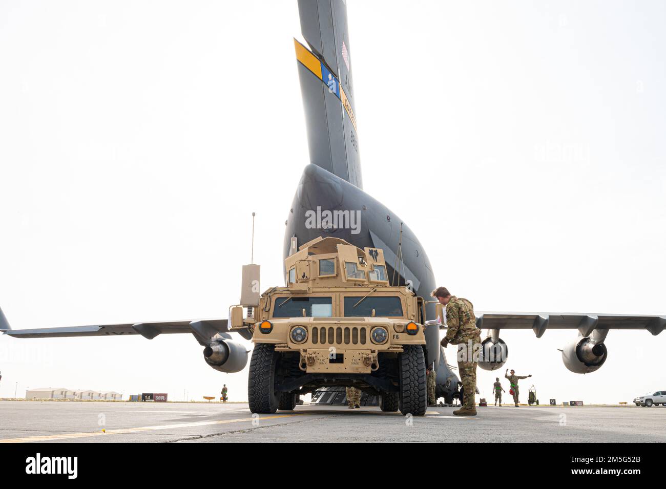 A U.S. Army Humvee assigned to the 1-153rd Cavalry Regiment, is loaded ...