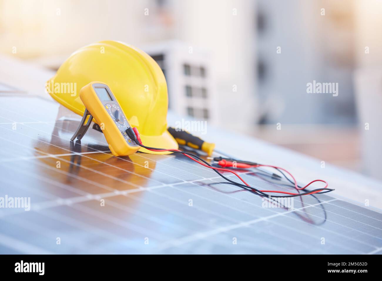 Tools, solar panels or helmet on roof for solar energy installation in ...